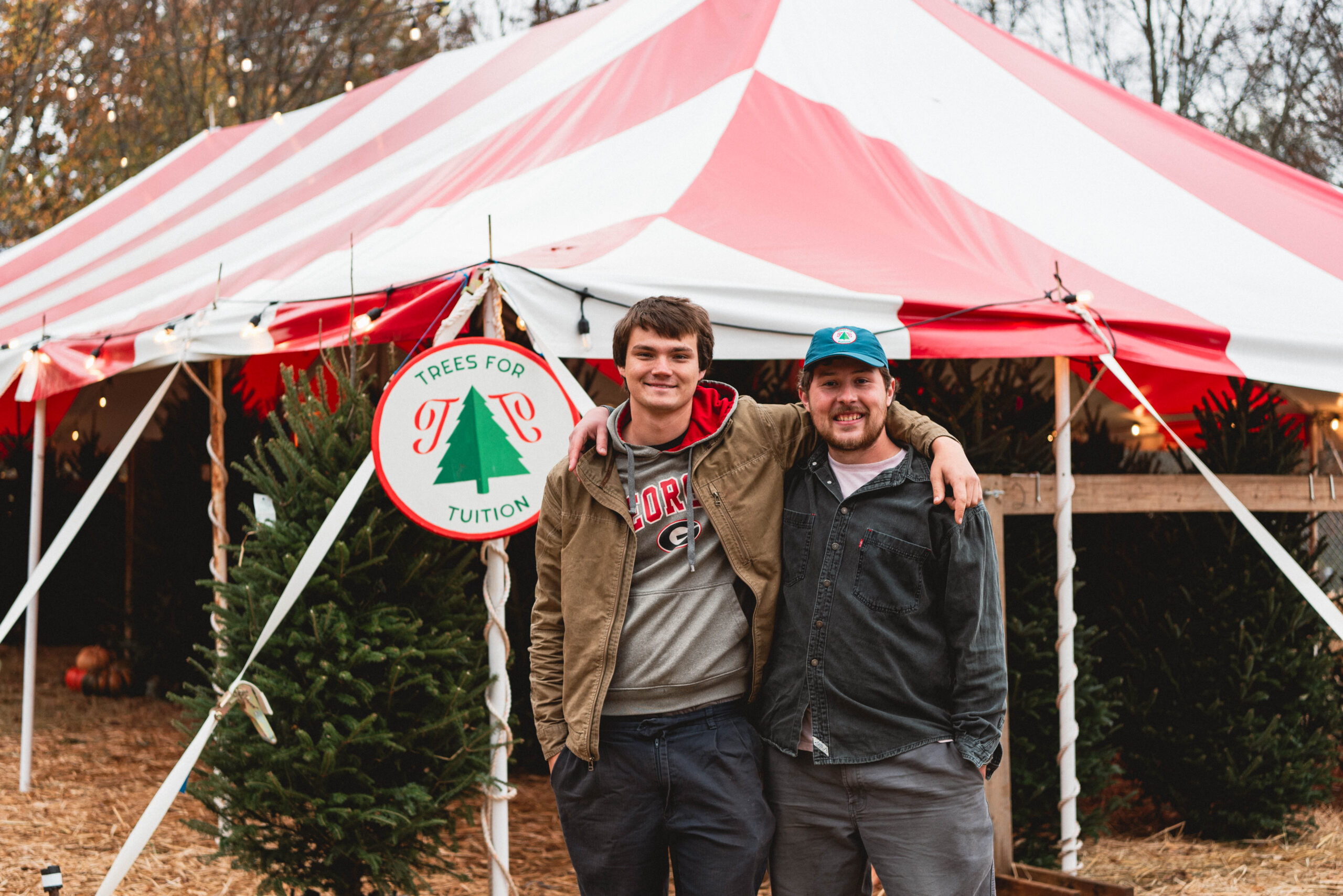 Jack and Calder in front of one of their Tents - Candler Park